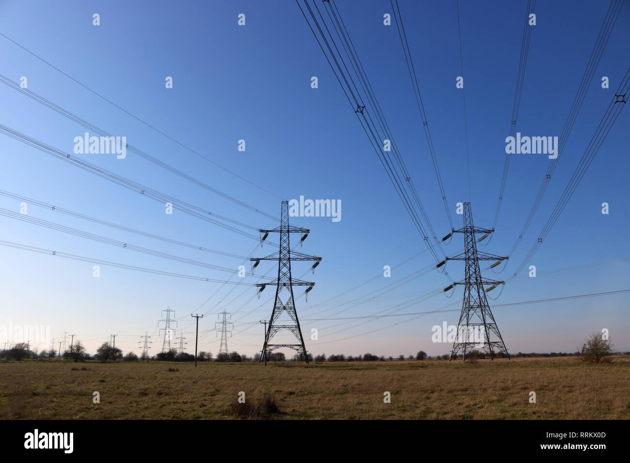 Electricity pylons crossing Higham Marshes near Cliffe in north Kent ...
