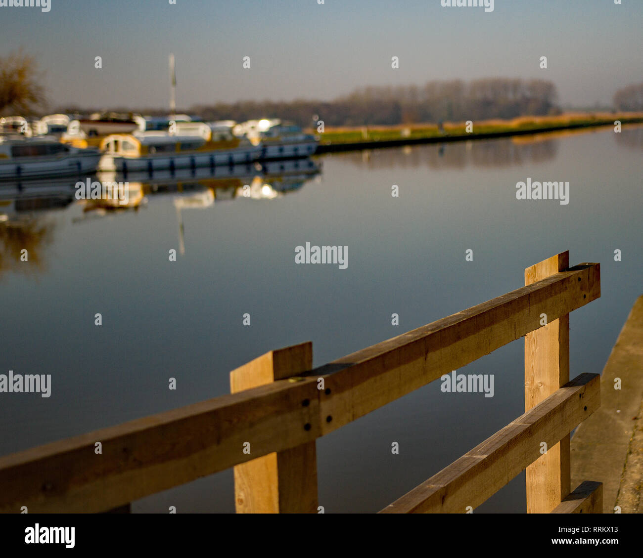 Wooden fence on the bank side of the River Bure, Acle Stock Photo - Alamy