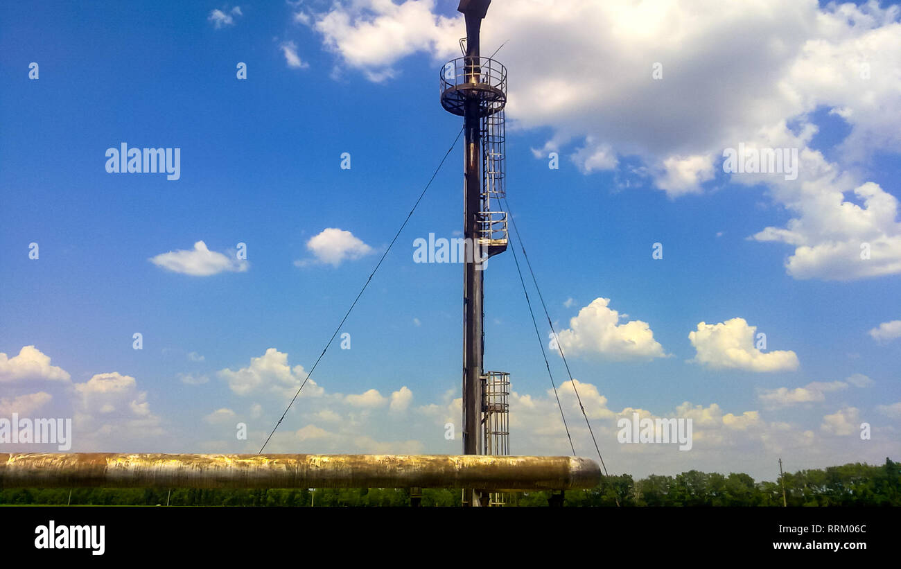 Flare for flaring associated gas. The end point of the pressure relief ...