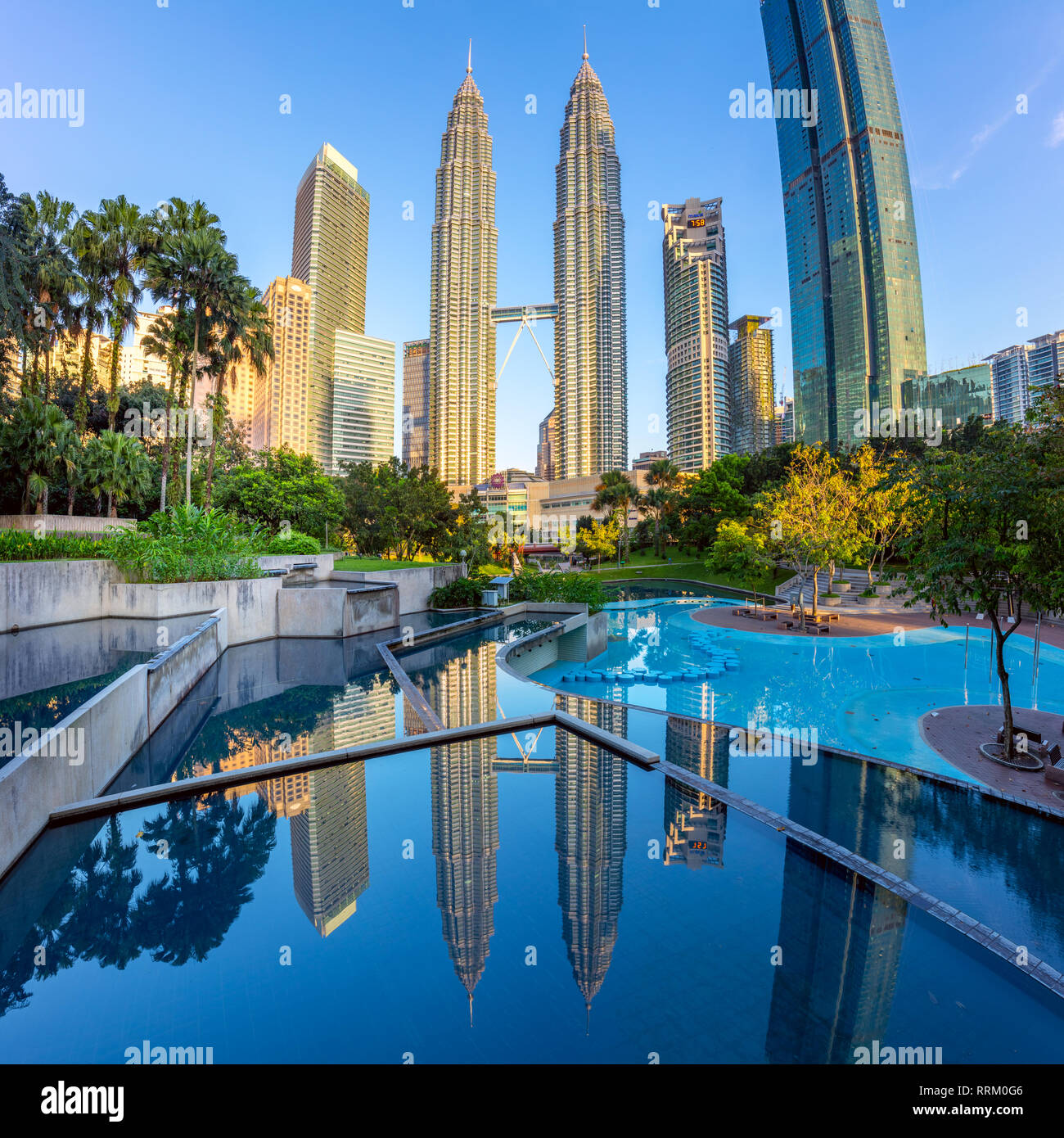 Klcc park petronas towers dusk hi-res stock photography and images - Alamy
