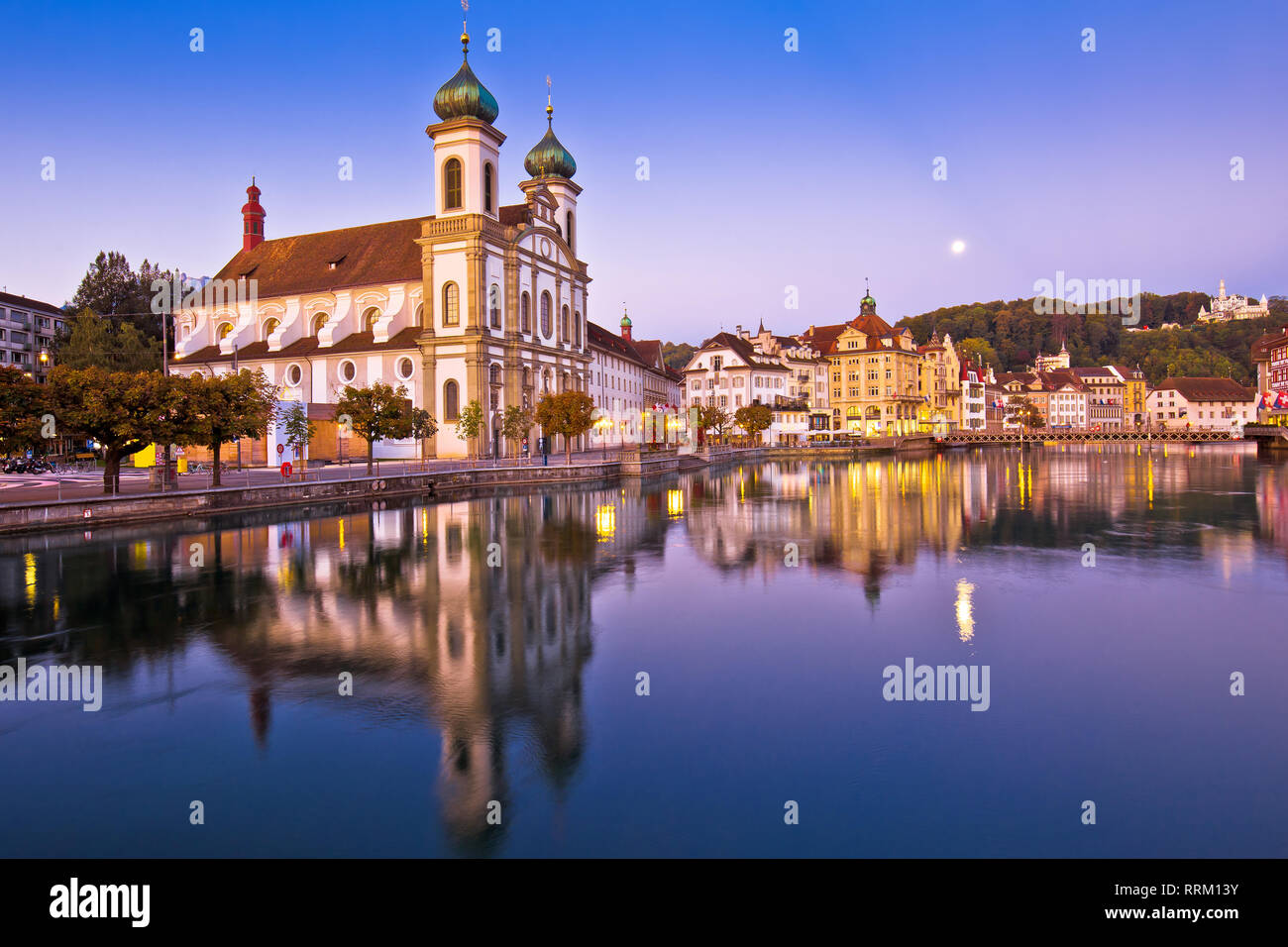 Luzern church and Reuss river waterfront dawn view, central Switzerland ...