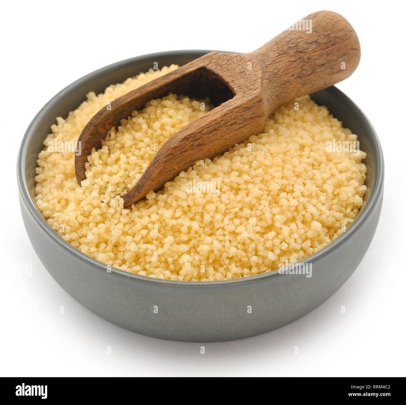 Couscous a North African cuisine in a bowl over white background Stock ...