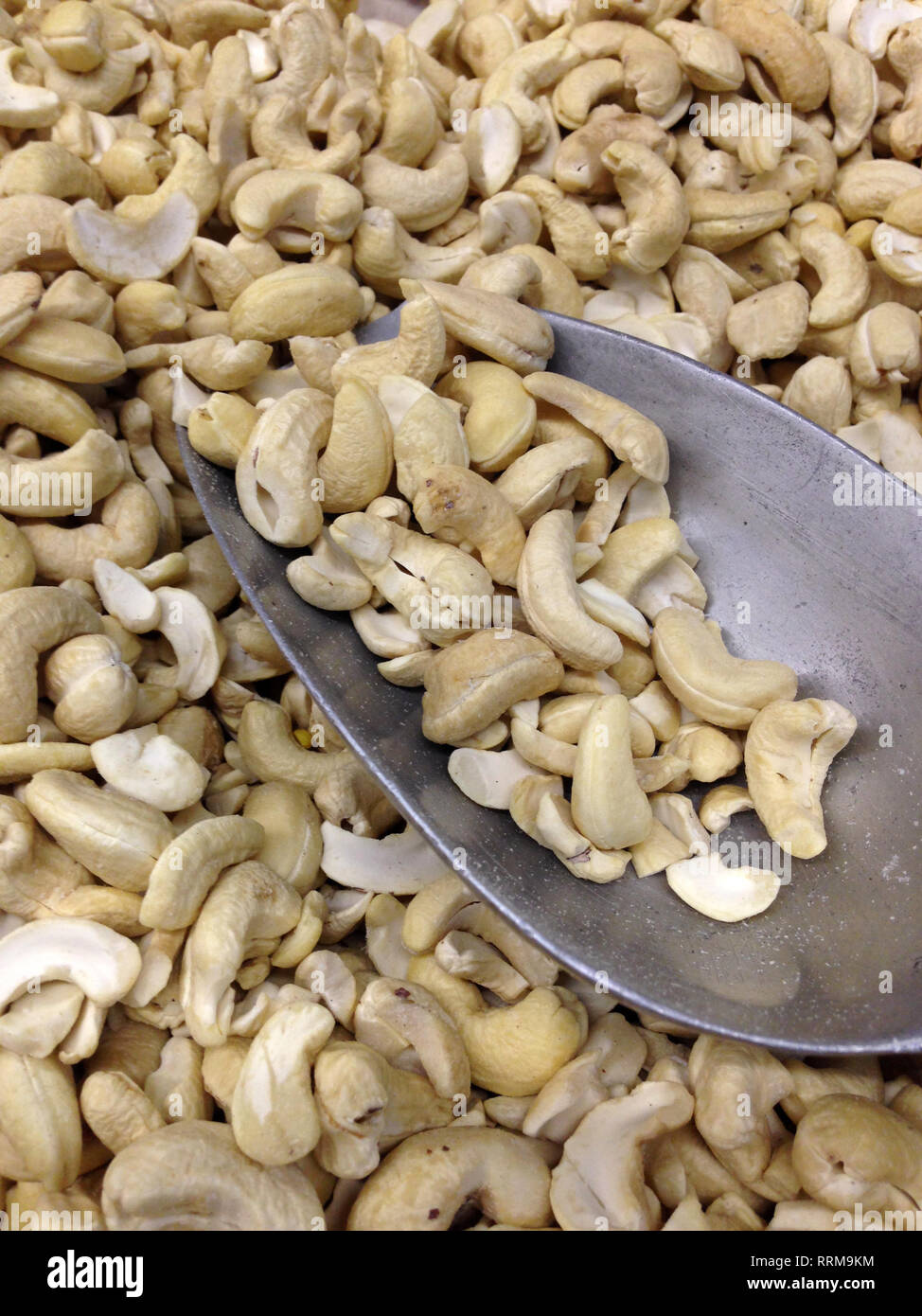 Roasted cashew nuts, texture and background. Top view Stock Photo - Alamy