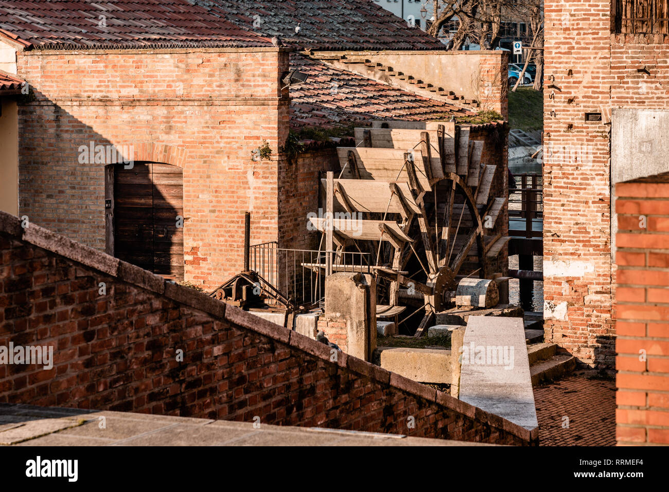 Old brick mill along a river Stock Photo - Alamy