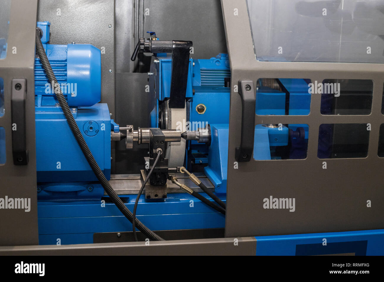 Lathe with robotic control. Machine for shaping wood, metal, or other ...