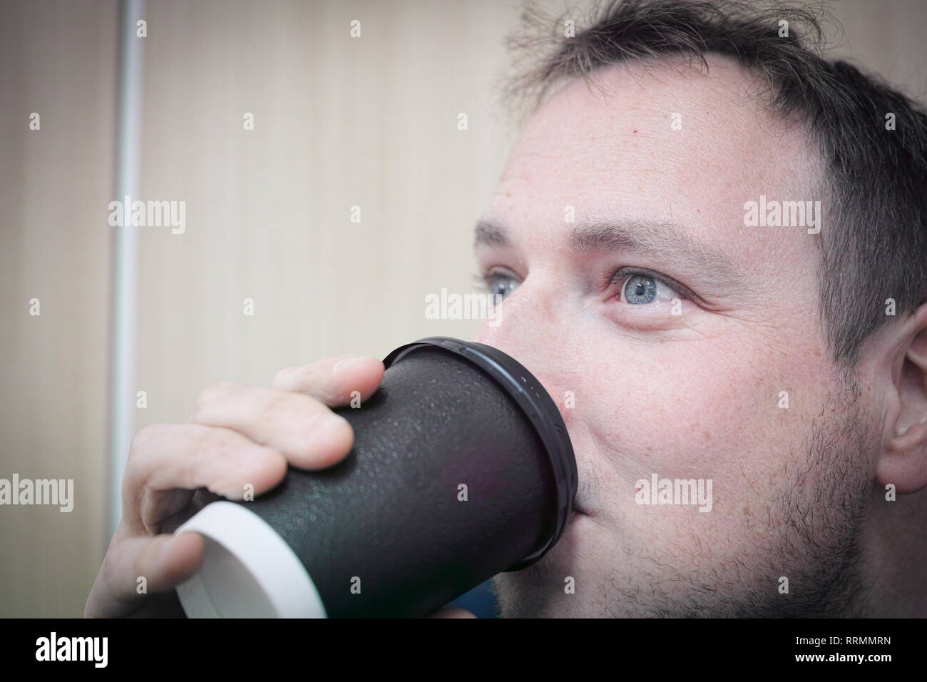 A man drinking his morning coffee Stock Photo - Alamy