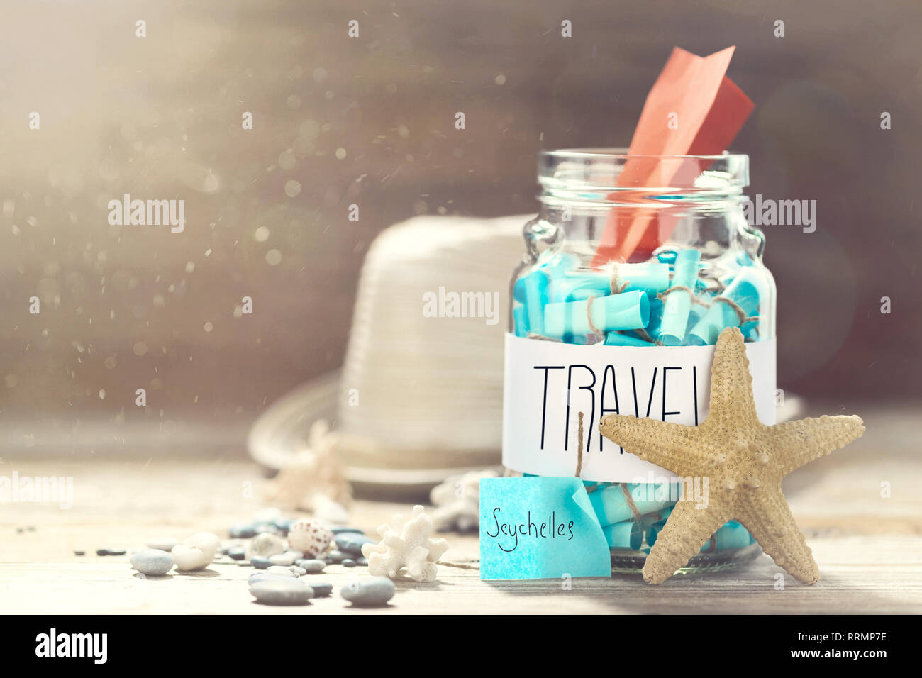 Creative travel concept Vacation planning Glass jar with list of ...