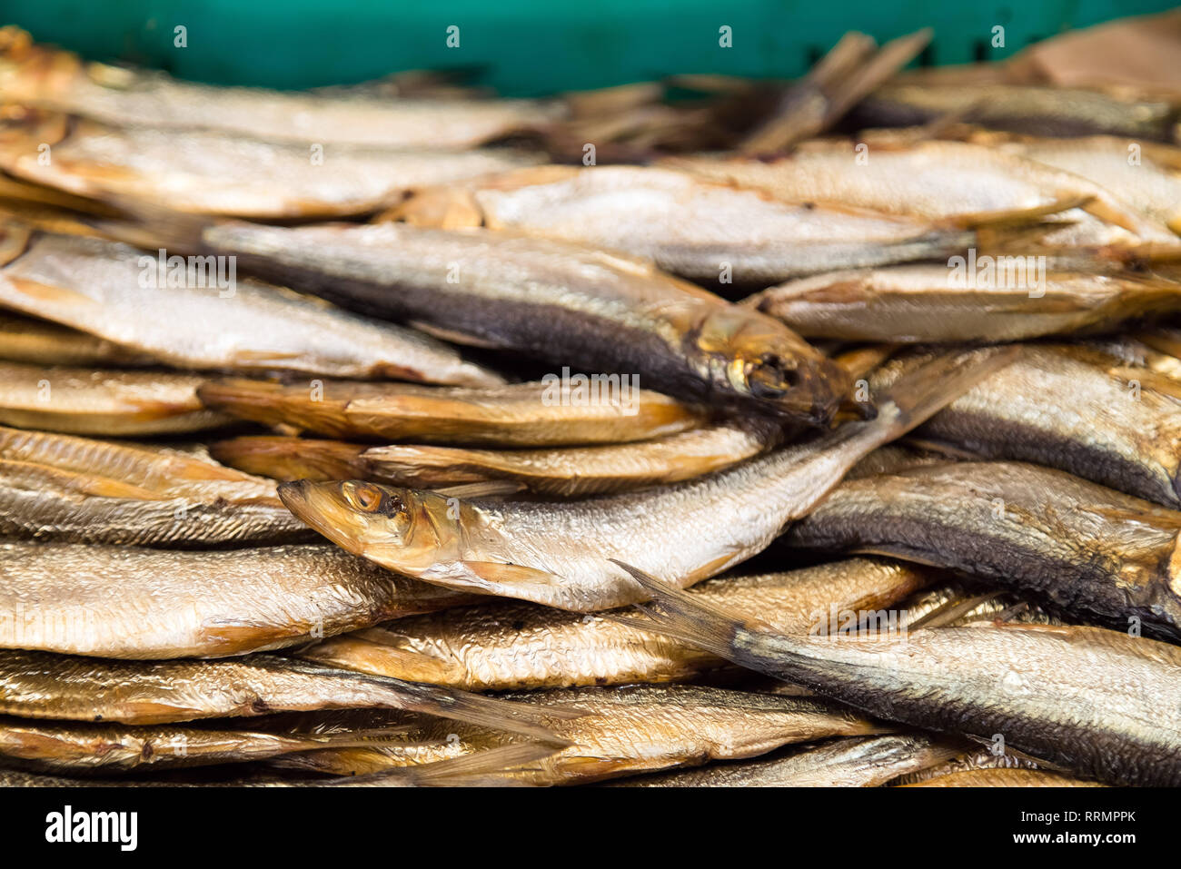 Smoked fish for sale at fish market. Smoked at smokehouse, delicious ...