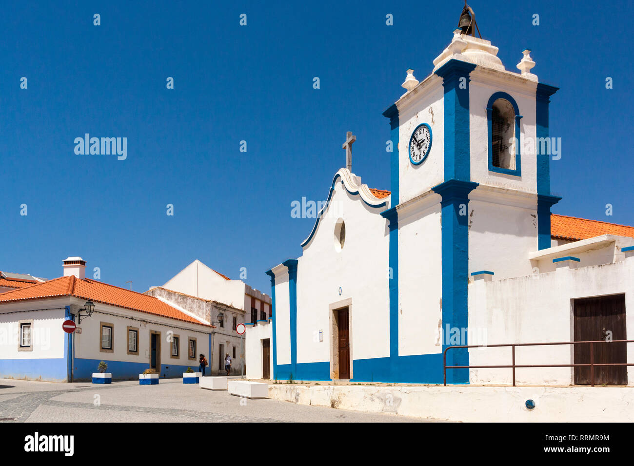 Small white and blue church in Portugal Stock Photo - Alamy