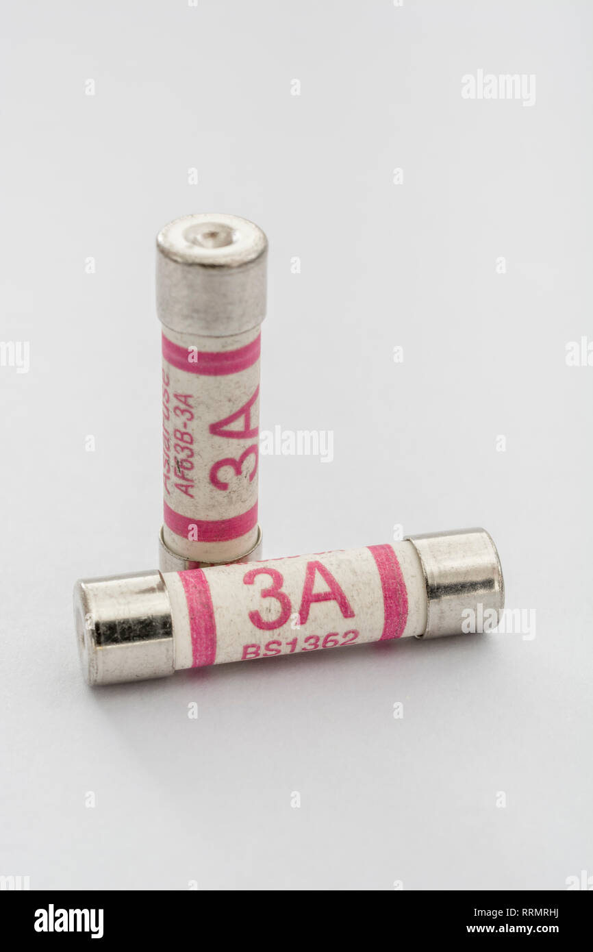 3 Amp household ceramic cartridge fuses Stock Photo - Alamy