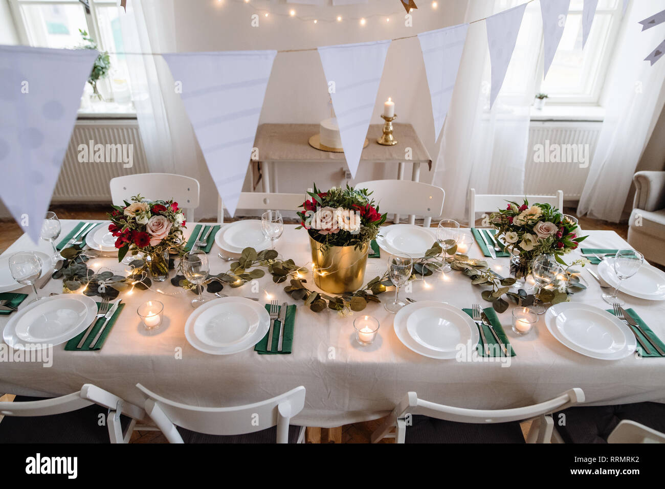 A top view of table set for a meal indoors in a room on a party, a ...