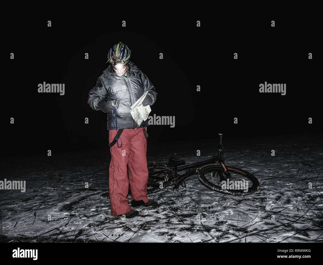 Woman biker travel in extreme night snowy nature. Sport and healthy ...