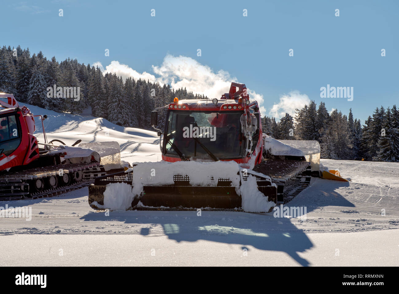 red snowcat on the mountain frosty winter day Stock Photo - Alamy
