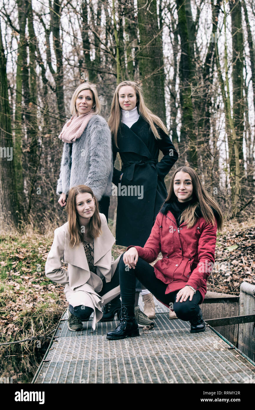 Portrait of a beautiful teenage girls in the nature, in the forest in ...