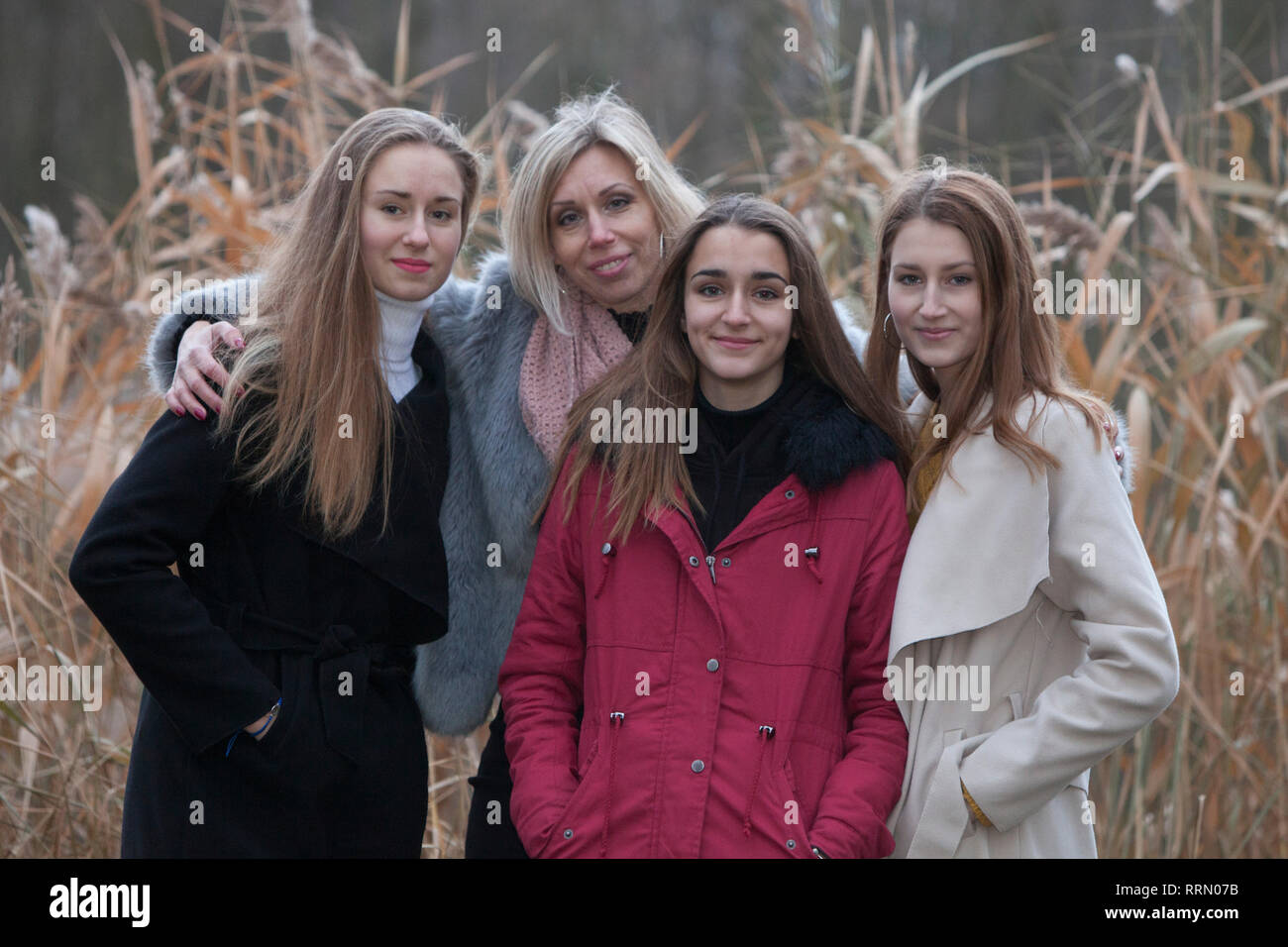 Portrait Of A Beautiful Teenage Girls In The Nature In The Forest In