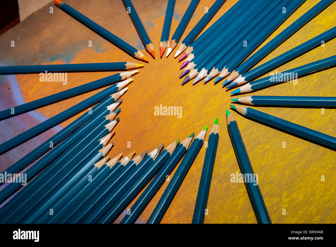 Heart shape made from artist coloured pencils Stock Photo - Alamy