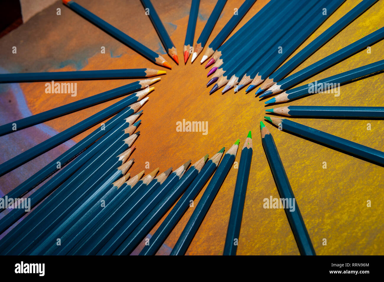 Heart shape made from artist coloured pencils Stock Photo - Alamy