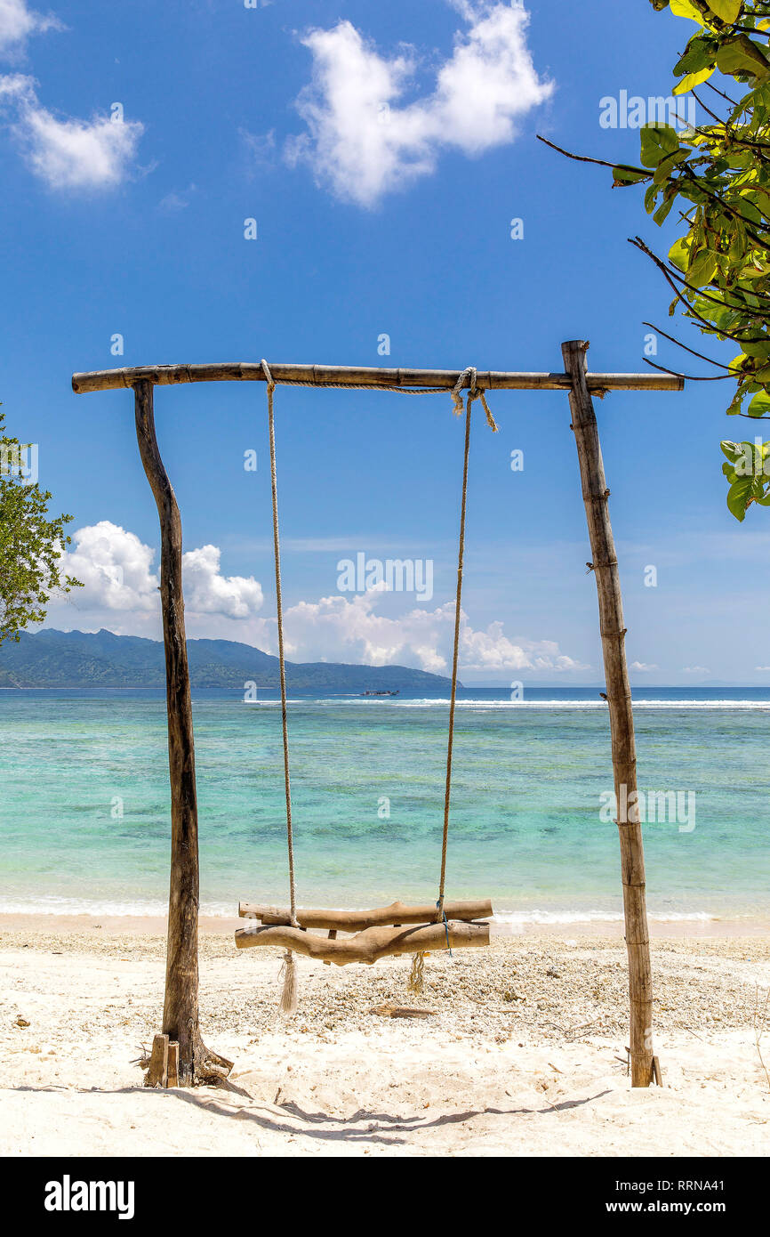 Wooden old Swing on the beach,Gili Trawangan Island, Lombok, Indonesia ...