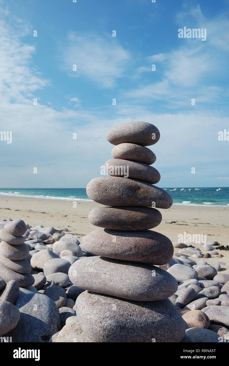 Pebble sculpture on a beach Stock Photo - Alamy