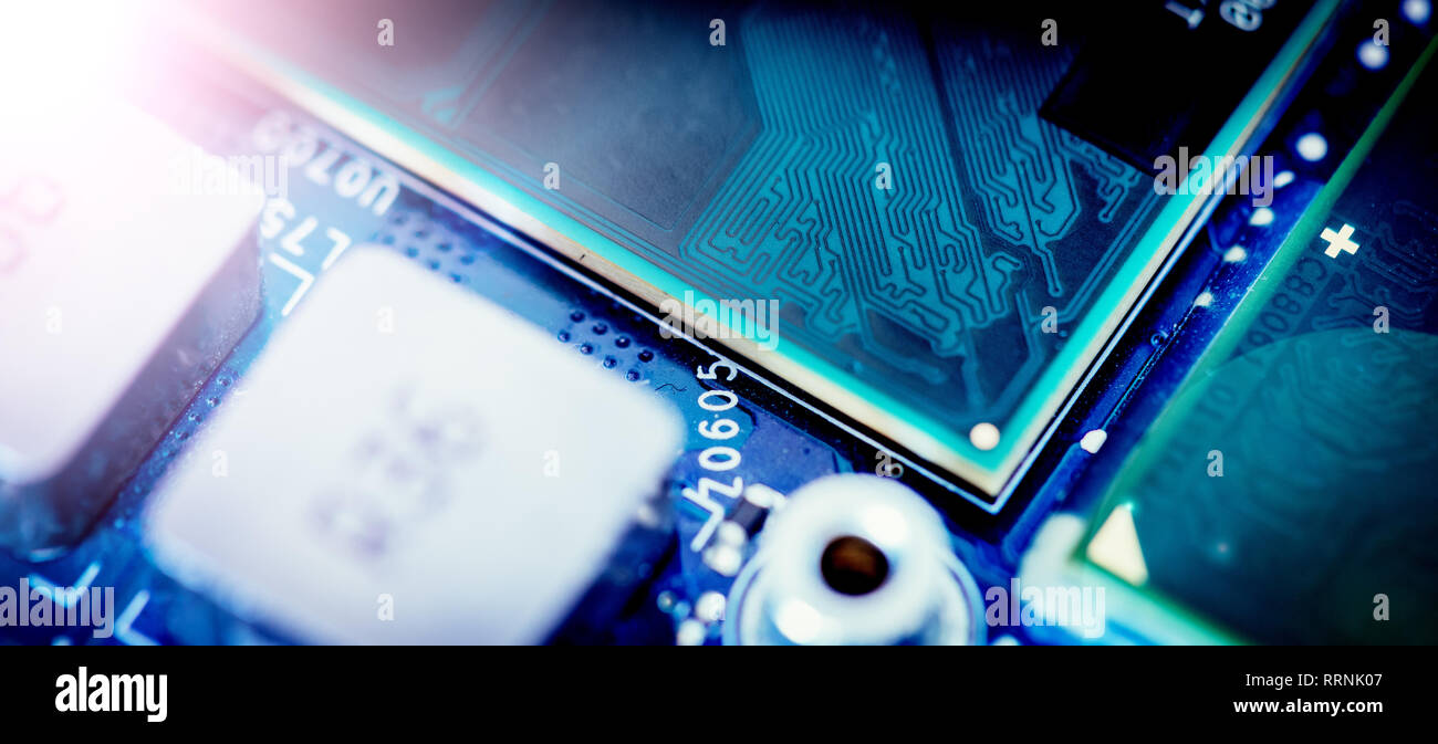 Computer chip on a circuit board, close up with light effect. Computer ...