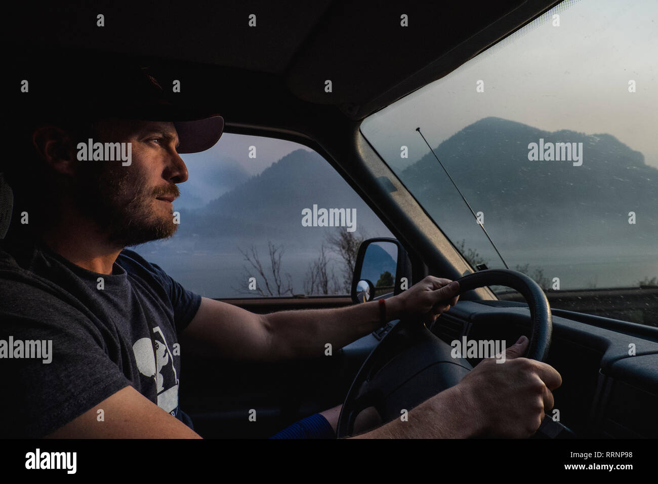 Man driving truck Stock Photo - Alamy