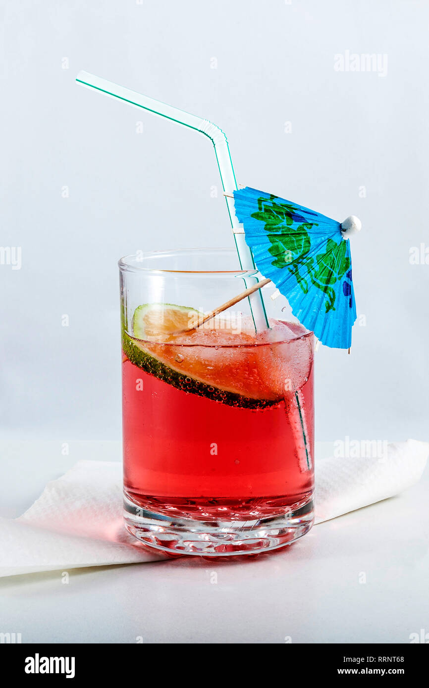 Cocktail with umbrella Stock Photo - Alamy