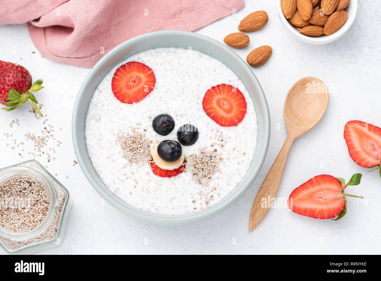 Funny face breakfast yogurt with fruits for kids. Top view. Food art ...