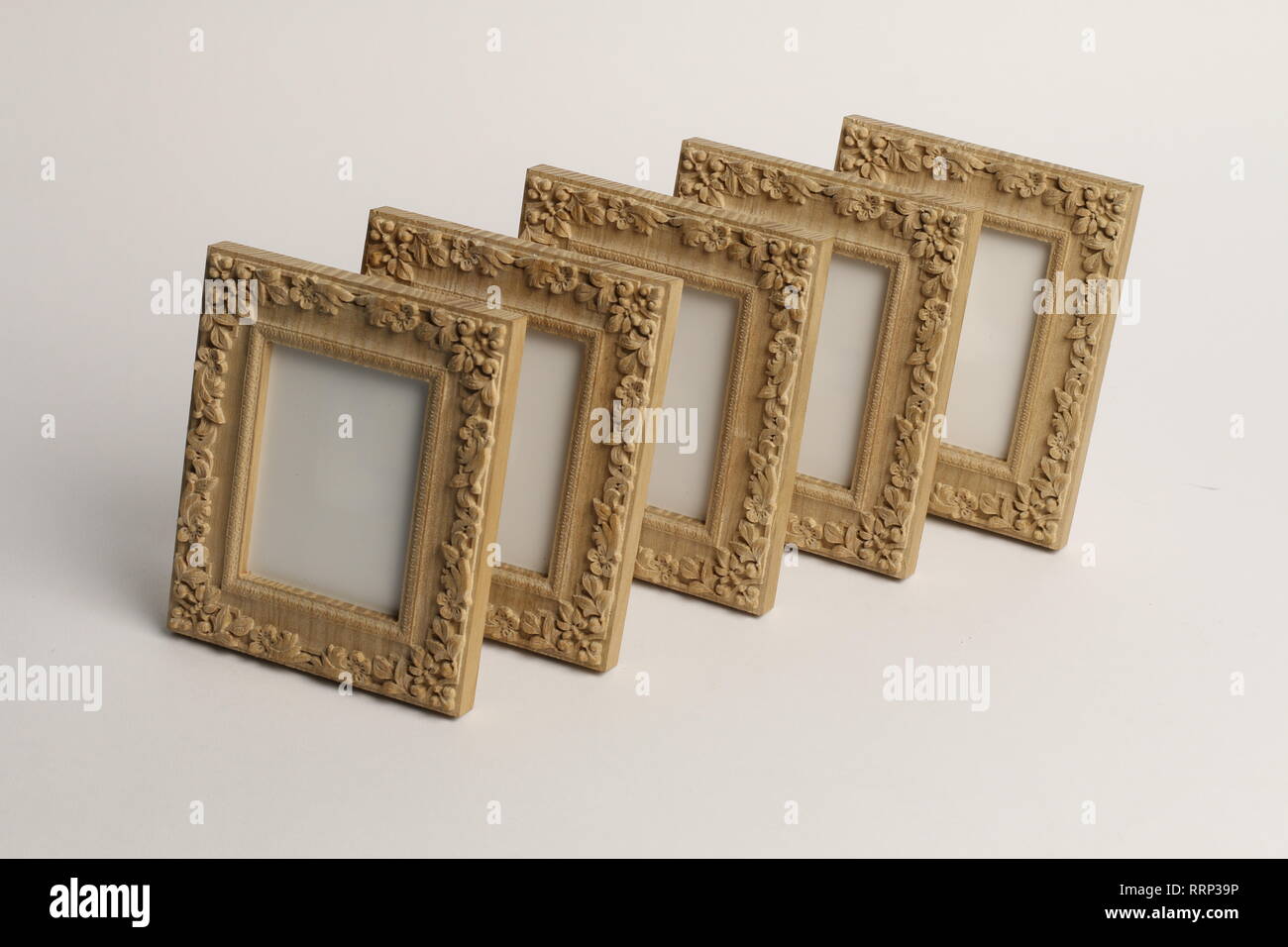 rotary miniature wooden frames cut for photographs or paintings ...