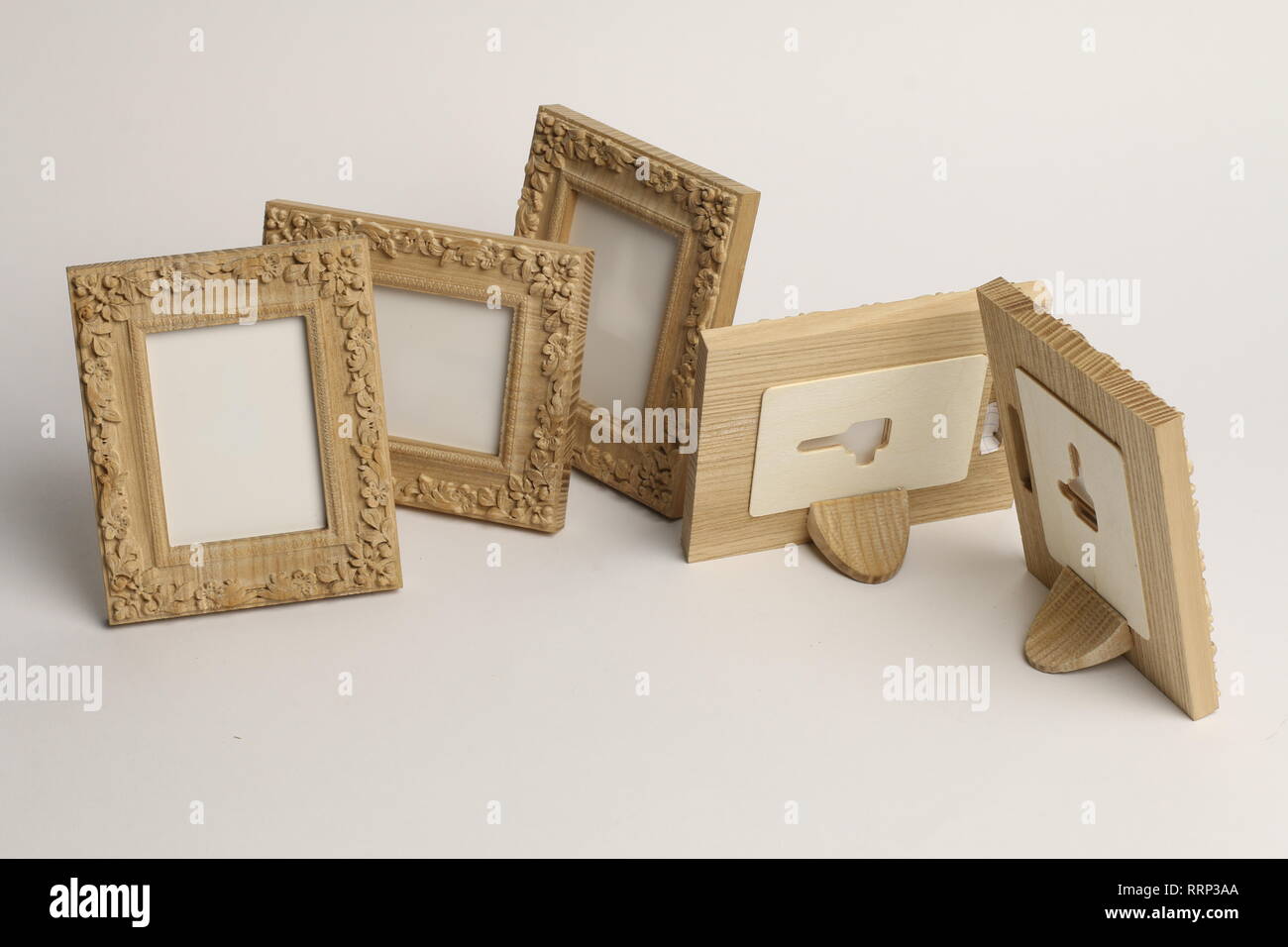 rotary miniature wooden frames cut for photographs or paintings ...