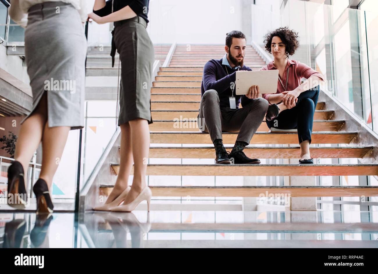 Sitting on a staircase hi-res stock photography and images - Alamy