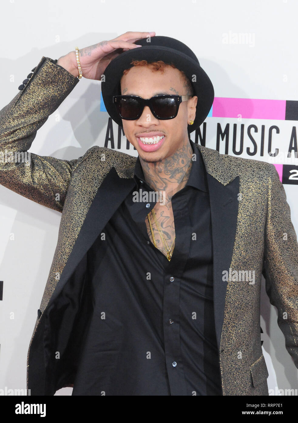 LOS ANGELES, CA - NOVEMBER 24: Rapper Tyga attends the 2013 American ...