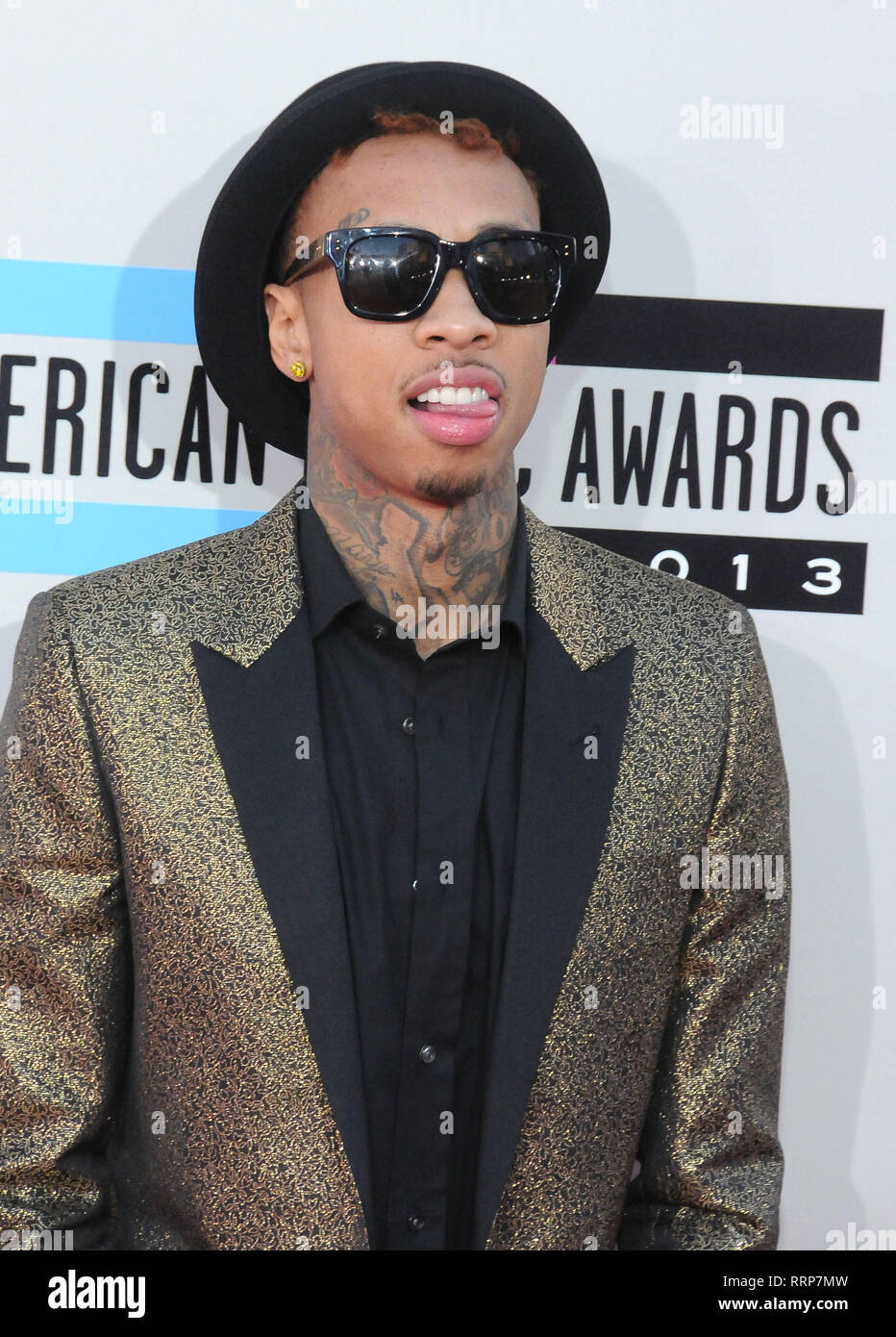 LOS ANGELES, CA - NOVEMBER 24: Rapper Tyga attends the 2013 American ...