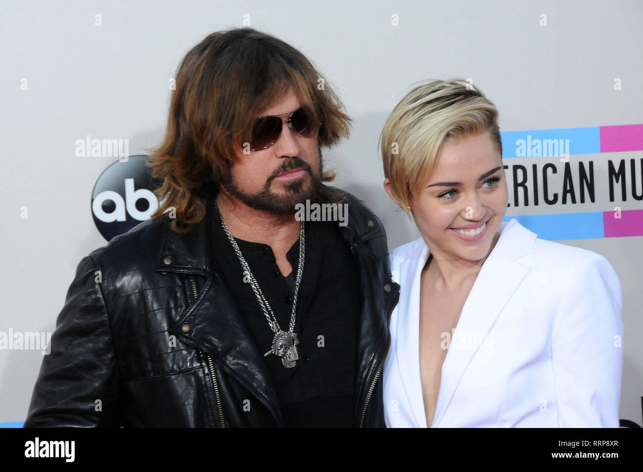 LOS ANGELES, CA - NOVEMBER 24: Singer Billy Ray Cyrus and daughter ...