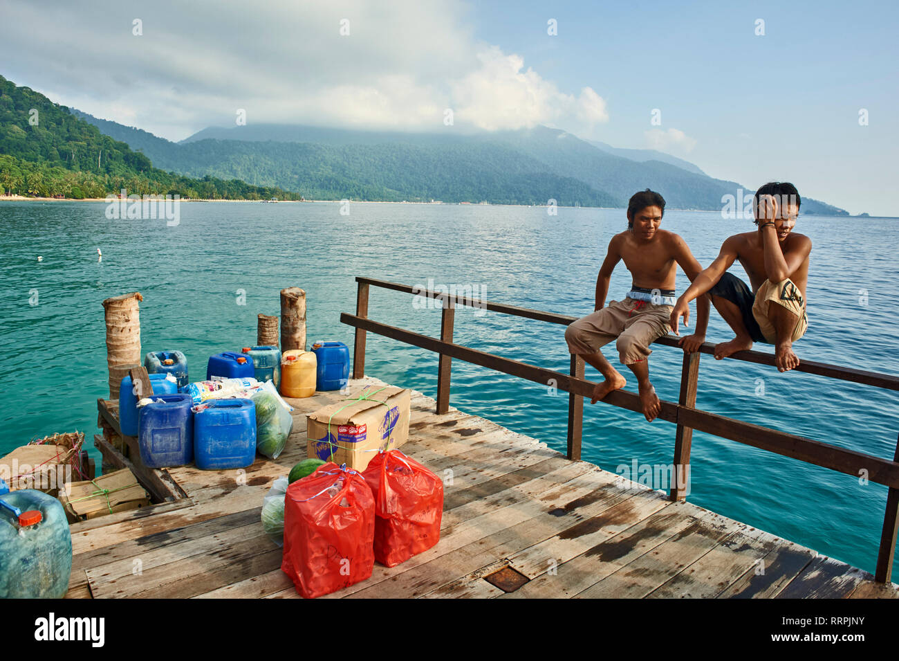 Resort staff has fun jumping into the water from the end of the Panuba ...