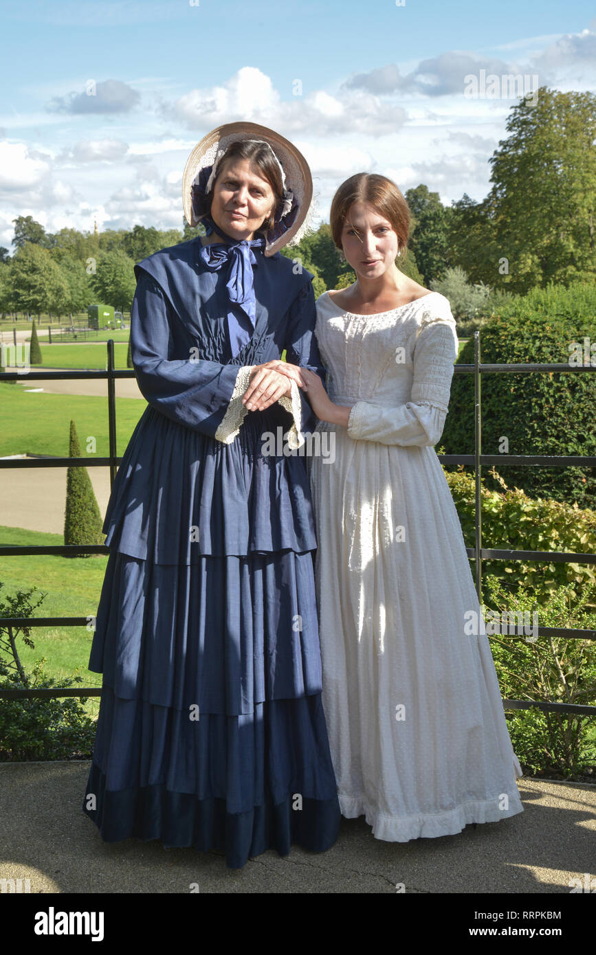 Two modern day women in historically accurate Victorian dress walk ...