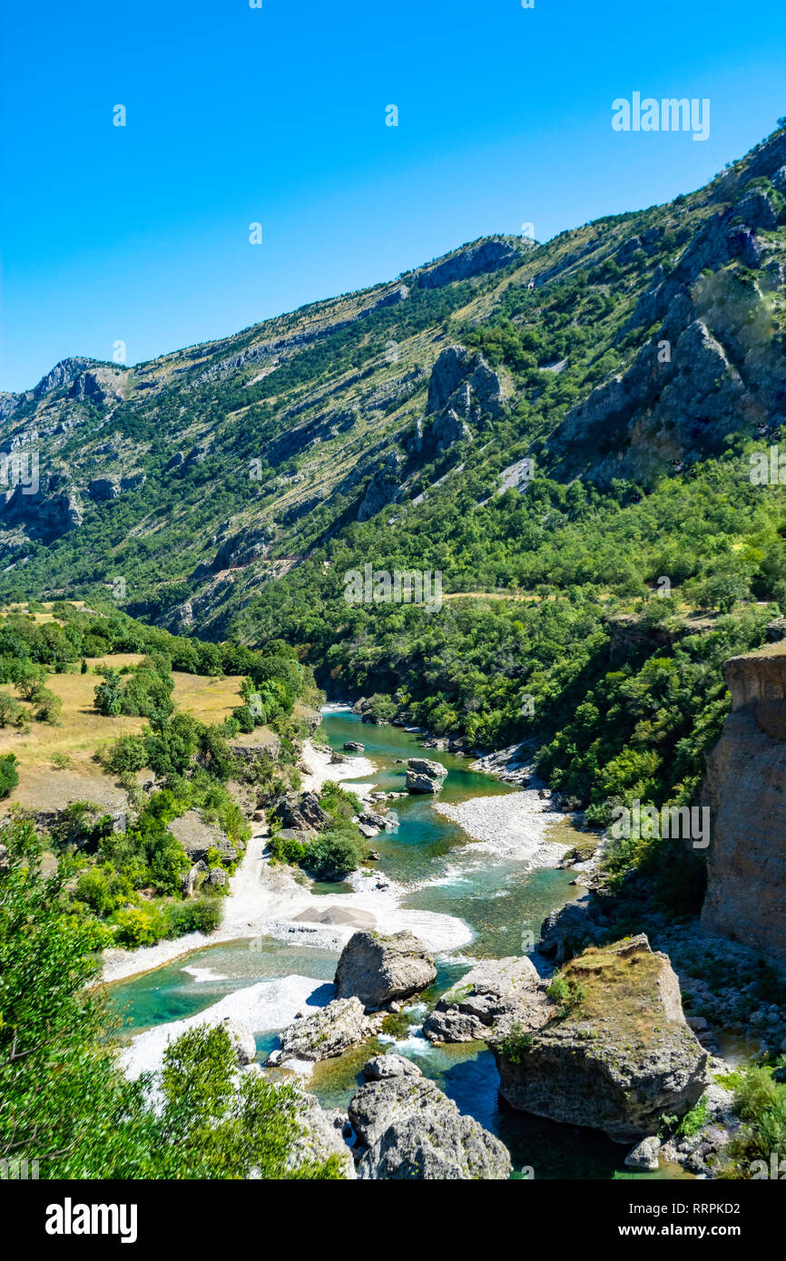 Landscape of river flowing through canyon with mountain ridge Stock ...