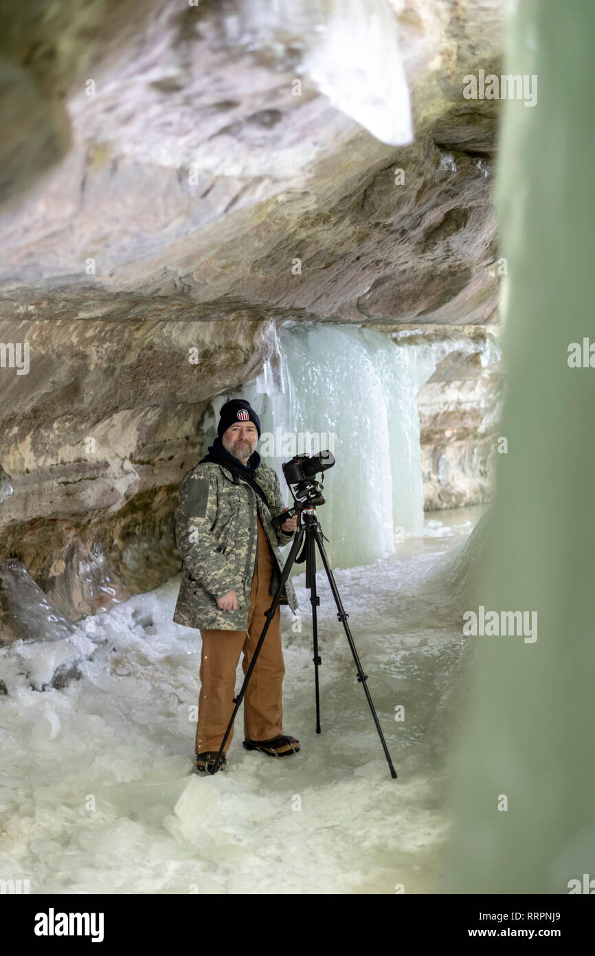 Eben Junction, Michigan - A photographer inside the Eben Ice Caves ...