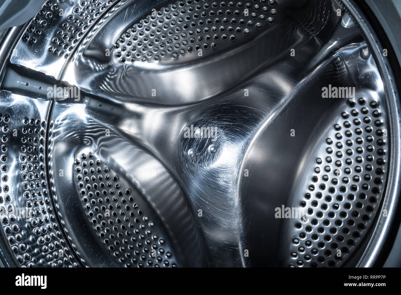 Clean drum of a modern washing machine close up Stock Photo - Alamy