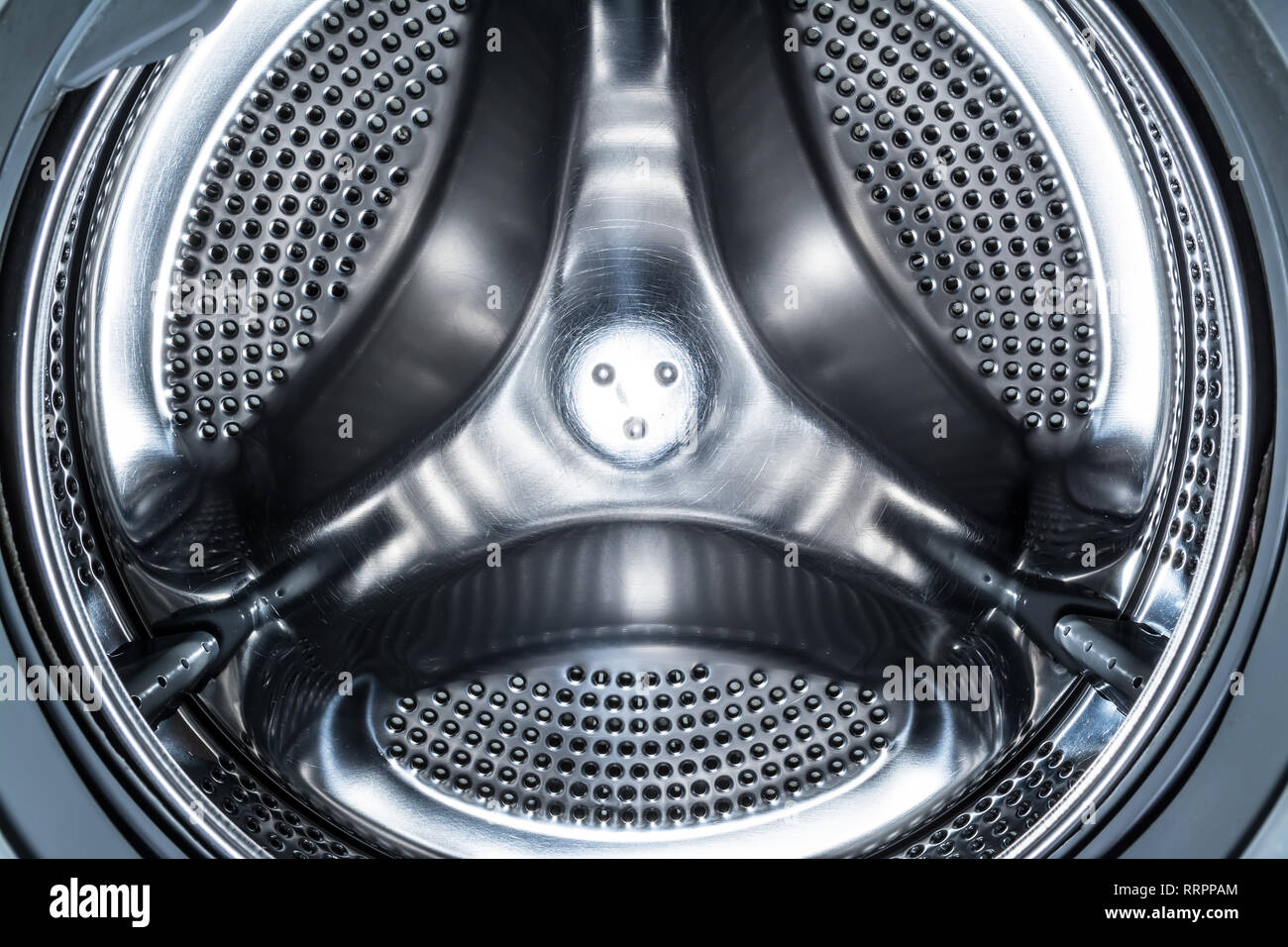 Clean drum of a modern washing machine close up Stock Photo - Alamy