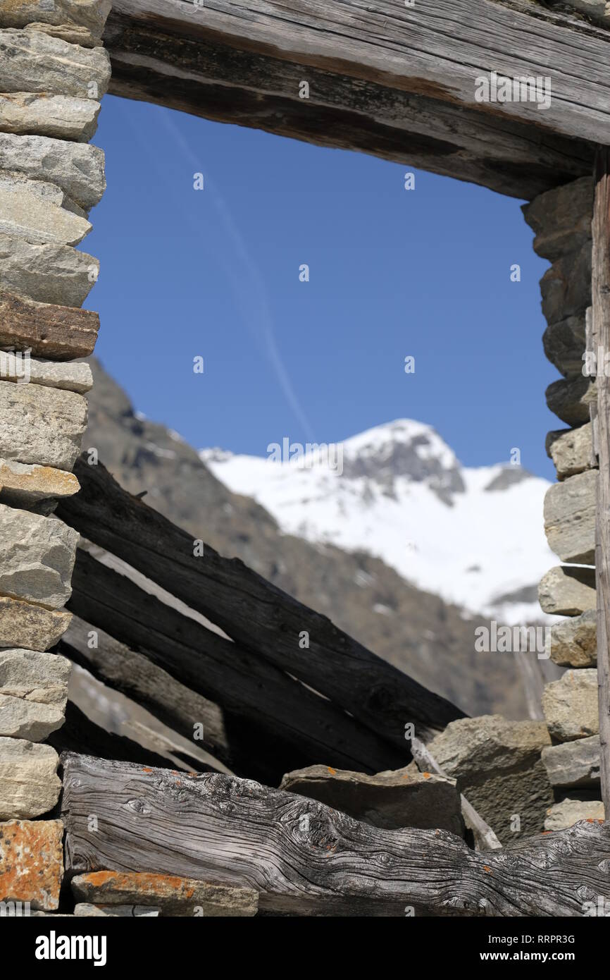 window of abandoned old wood house in italian alps - mountain Stock ...