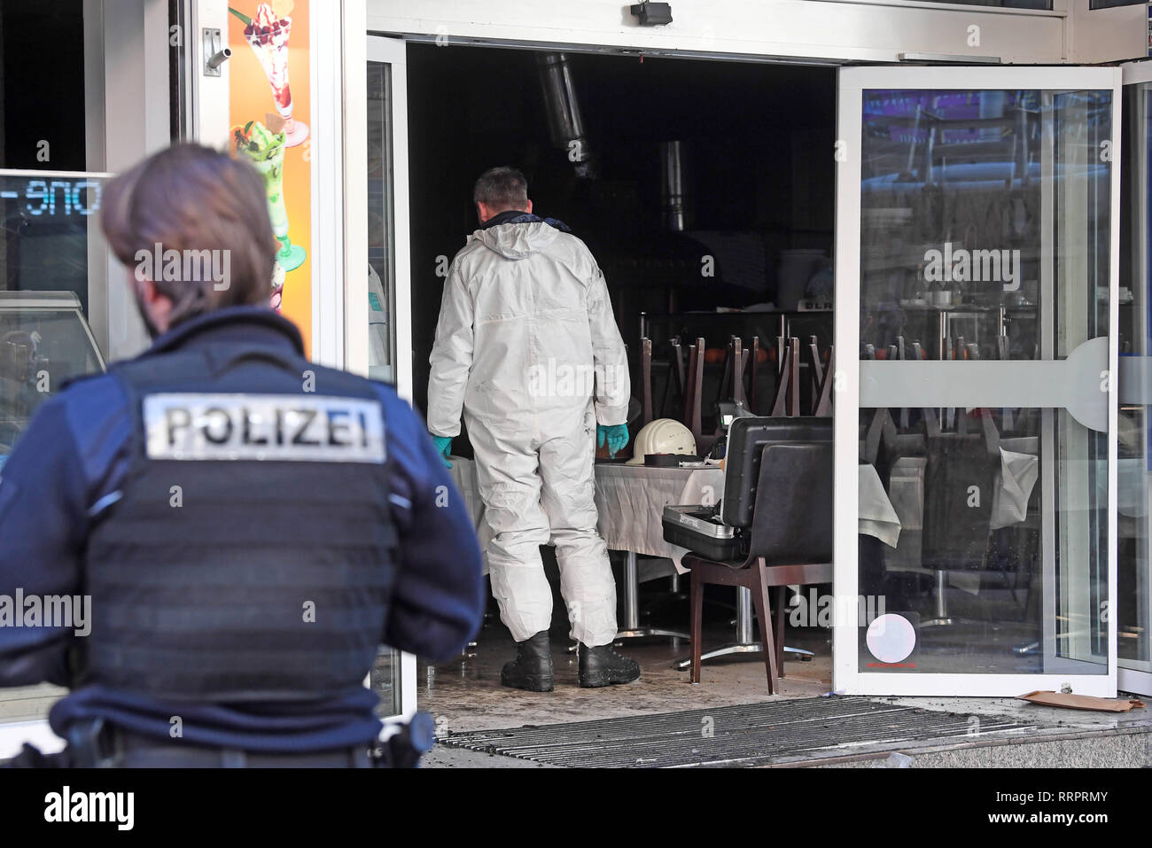 26 February 2019, Baden-Wuerttemberg, Karlsruhe: A police officer is ...