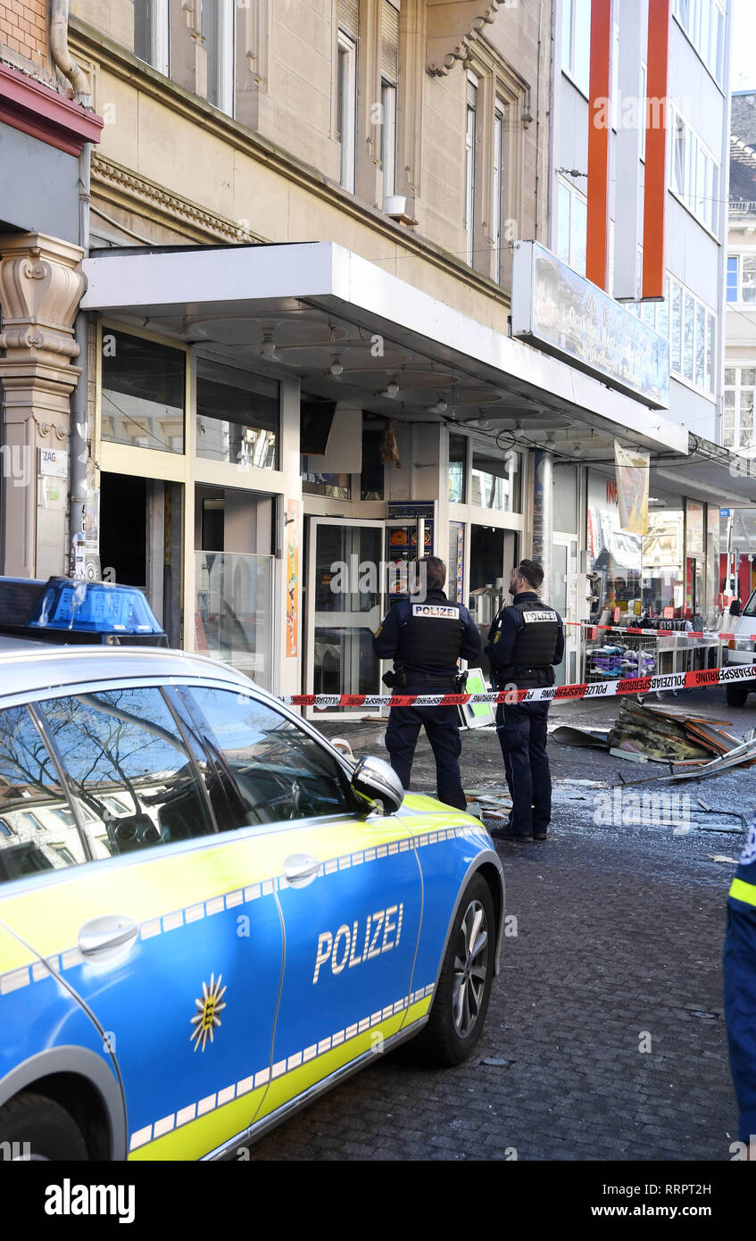 Karlsruhe, Germany. 26th Feb, 2019. Police officers and a patrol car ...