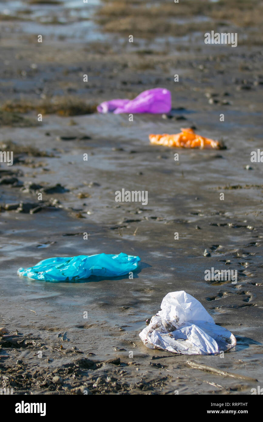 Deflated balloons at a beach hi-res stock photography and images - Alamy