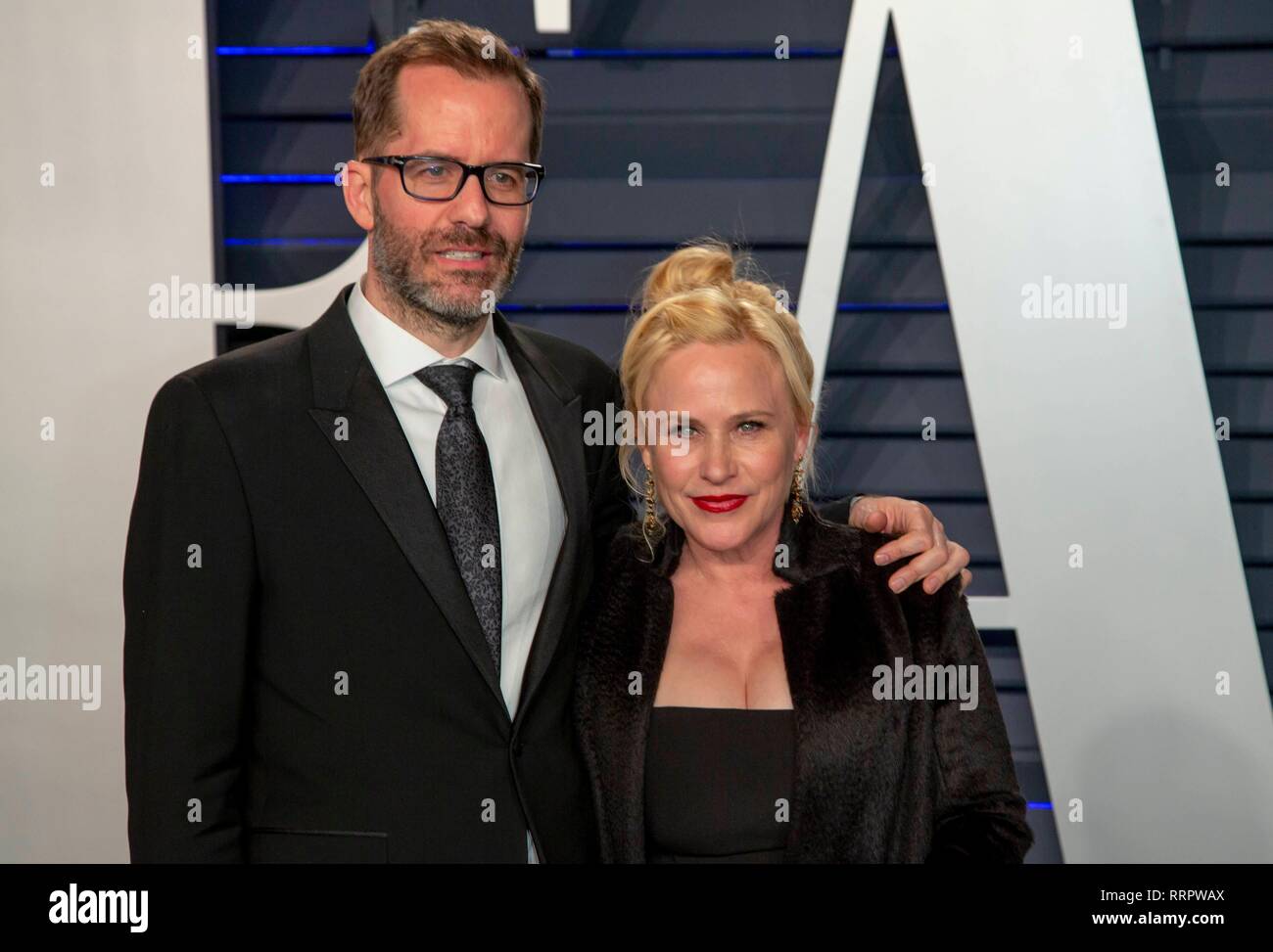 Eric White (l) and Patricia Arquette attend the Vanity Fair Oscar Party ...