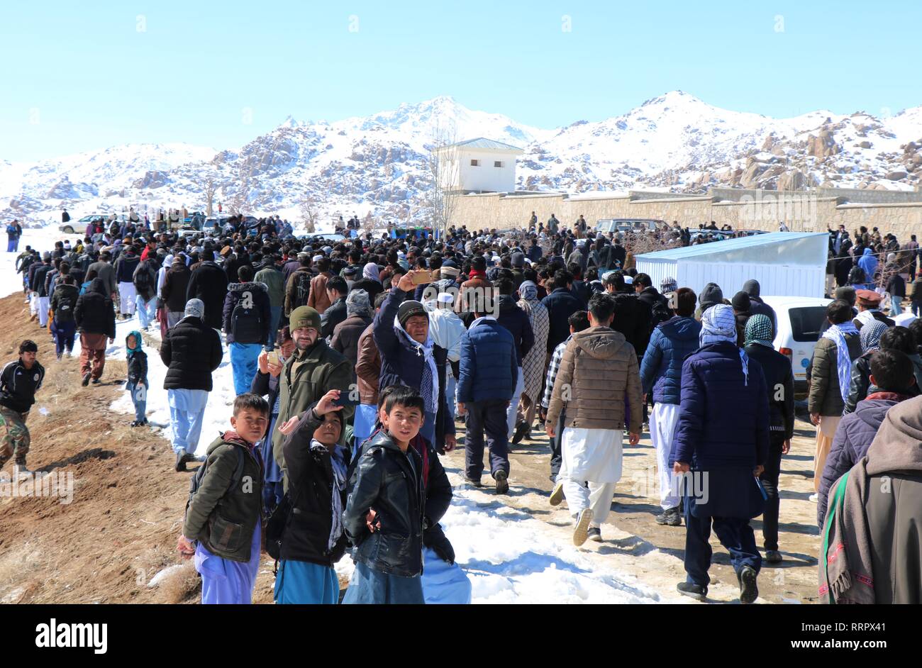 Ghazni, Afghanistan. 26th Feb, 2019. Local people gather during a ...