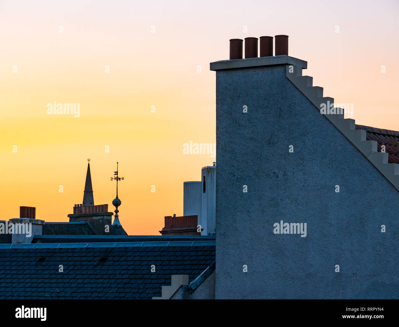 Roof top chimney sunset silhouette hi-res stock photography and images ...