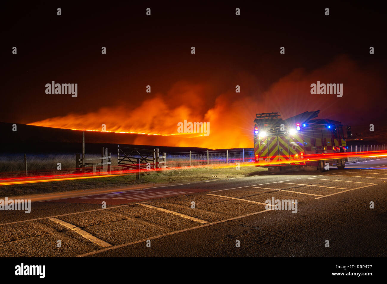 Fire appliances attend a moorland fire on Marsden Moor, close to the ...