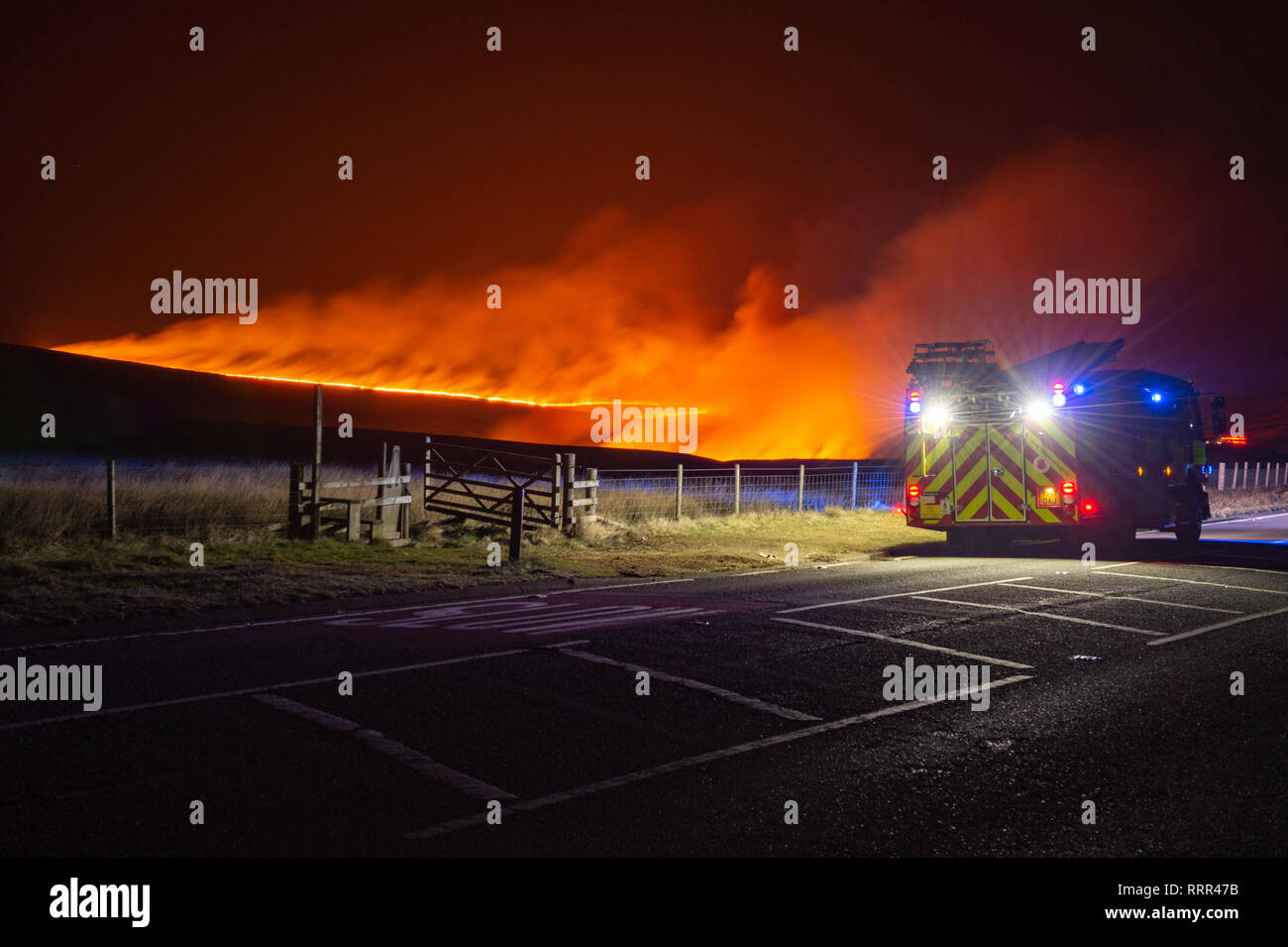 Fire appliances attend a moorland fire on Marsden Moor, close to the ...
