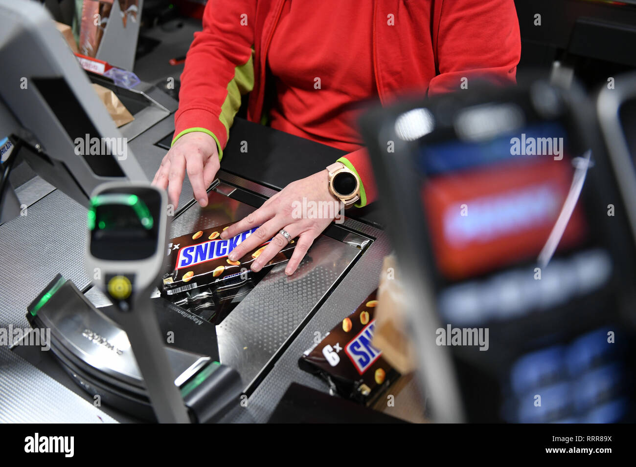 Berlin, Germany. 22nd Feb, 2019. A cashier scans a chocolate bar at the ...
