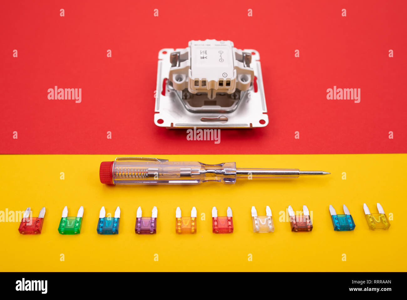 Set of electrical tool and white socket on colorful background Stock ...